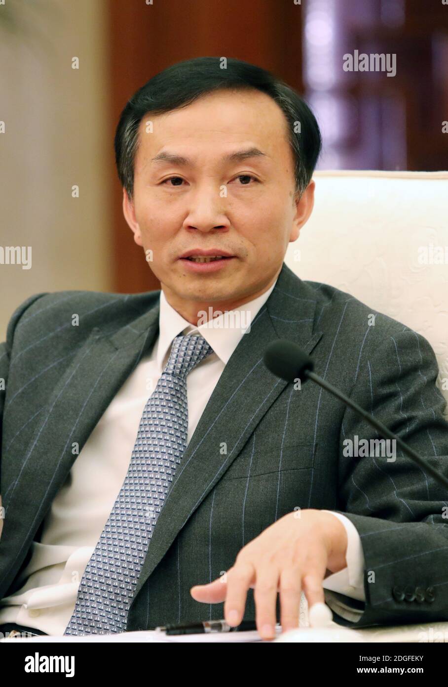 Dai Xinmin, the president of Huashi Pharma Holdings Co., Ltd, delivers ...