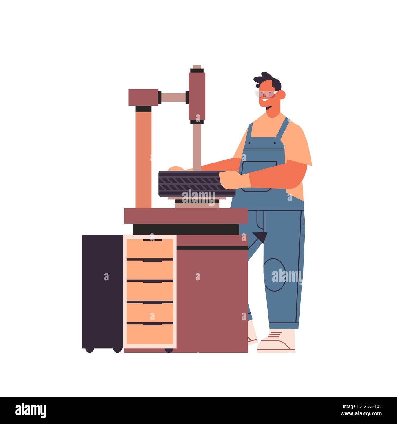 mechanic in uniform repairing tire man working and fixing wheel car ...