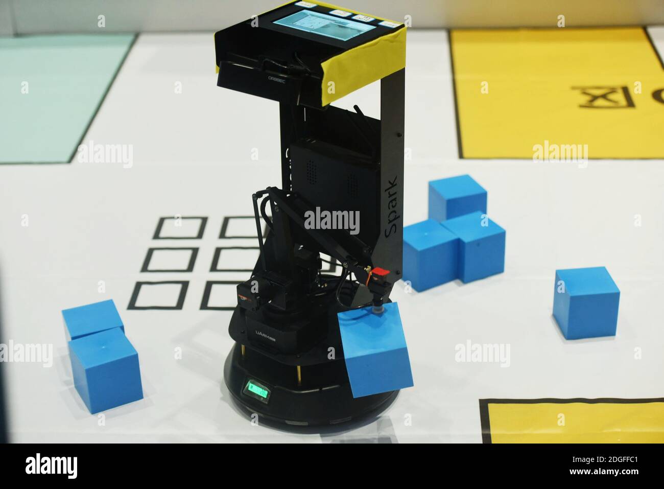 A robot hand carries cubicles at the 2020 RoboCom in Hangzhou city ...