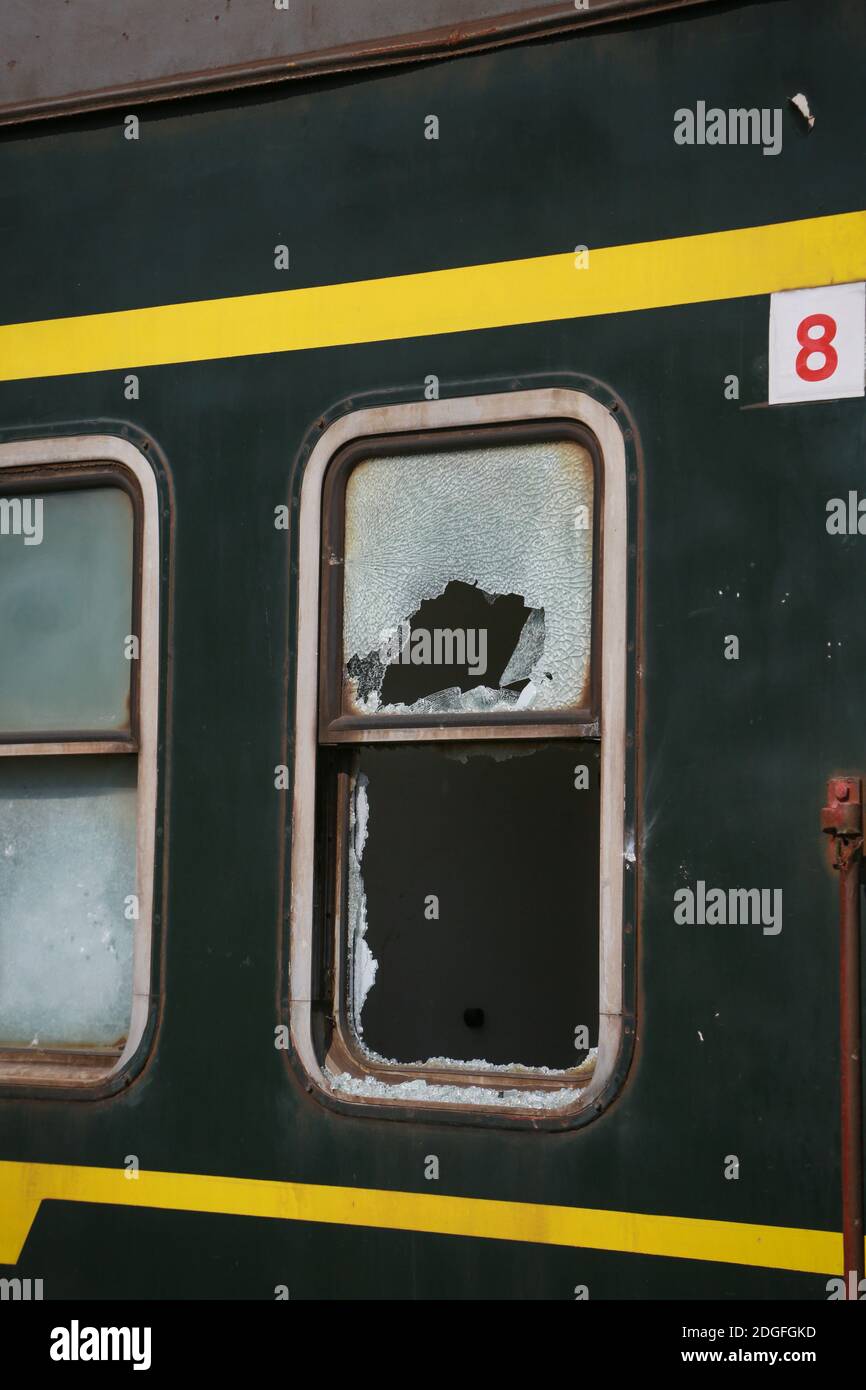 There are piles of abandoned green-skinned trains on the train ...