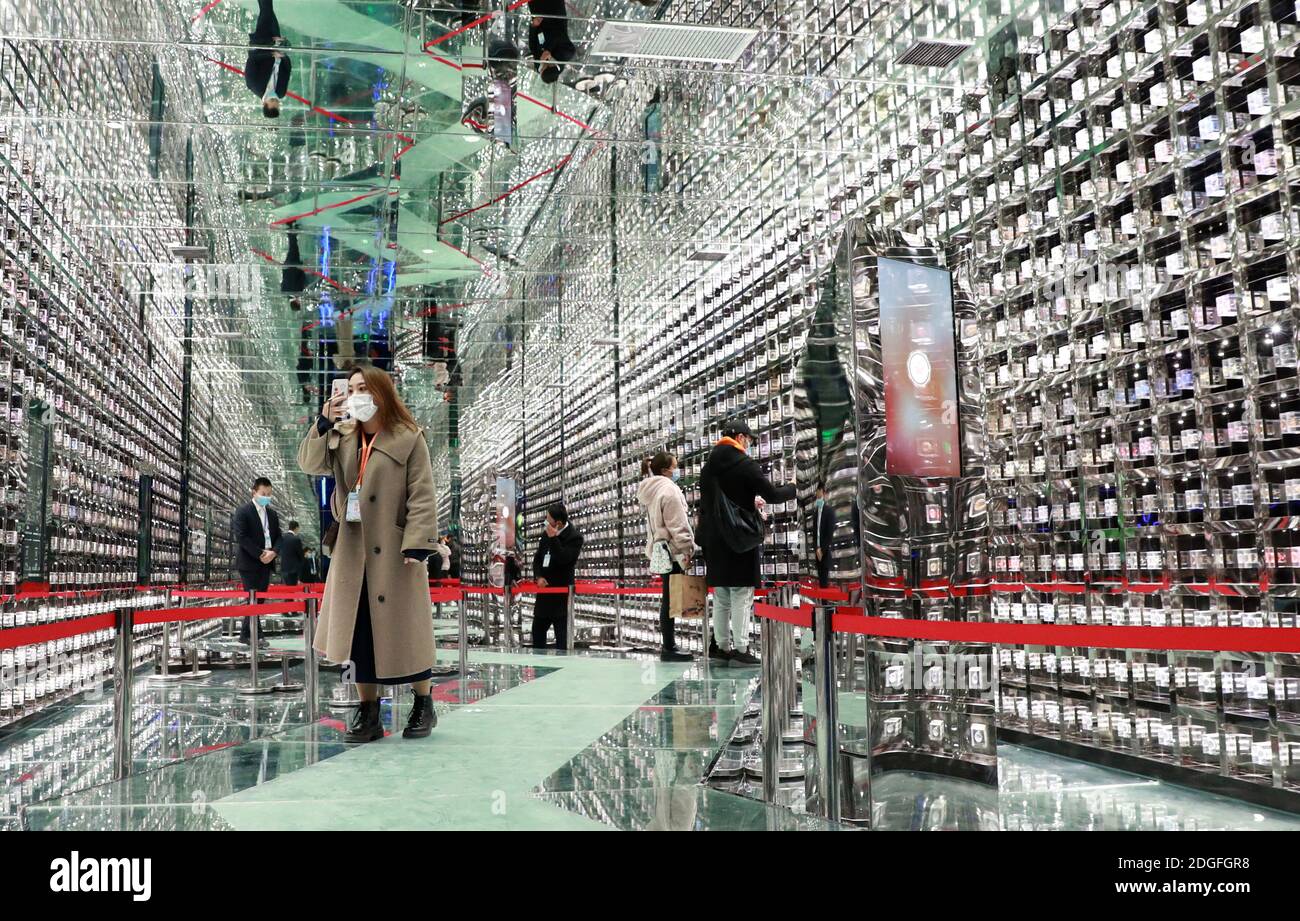 People observe the seeds preserved and presented at the "Seed Bank ...