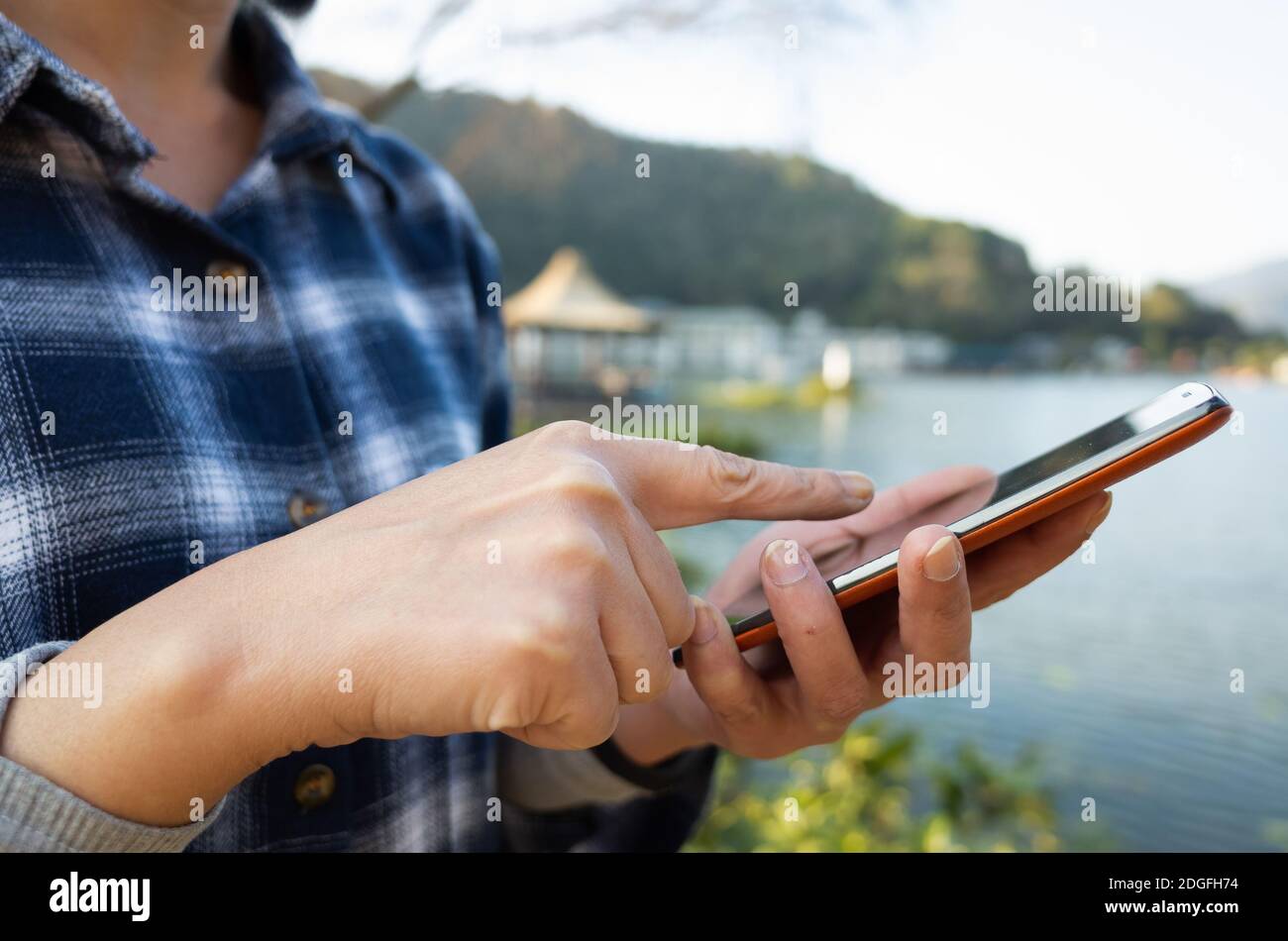 Woman hand using touchscreen hi-res stock photography and images - Alamy