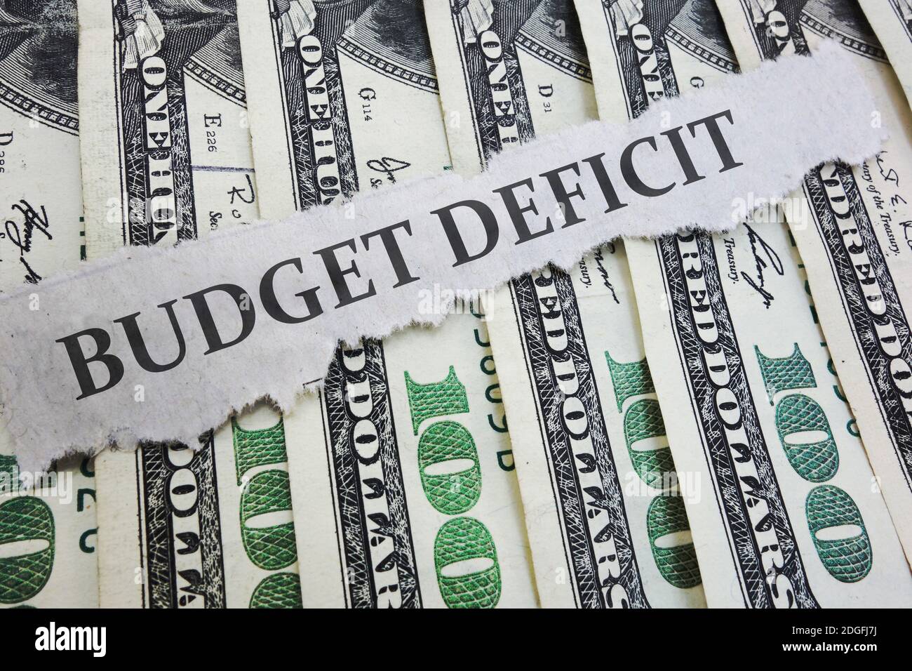 Budget Deficit news headline on money Stock Photo - Alamy