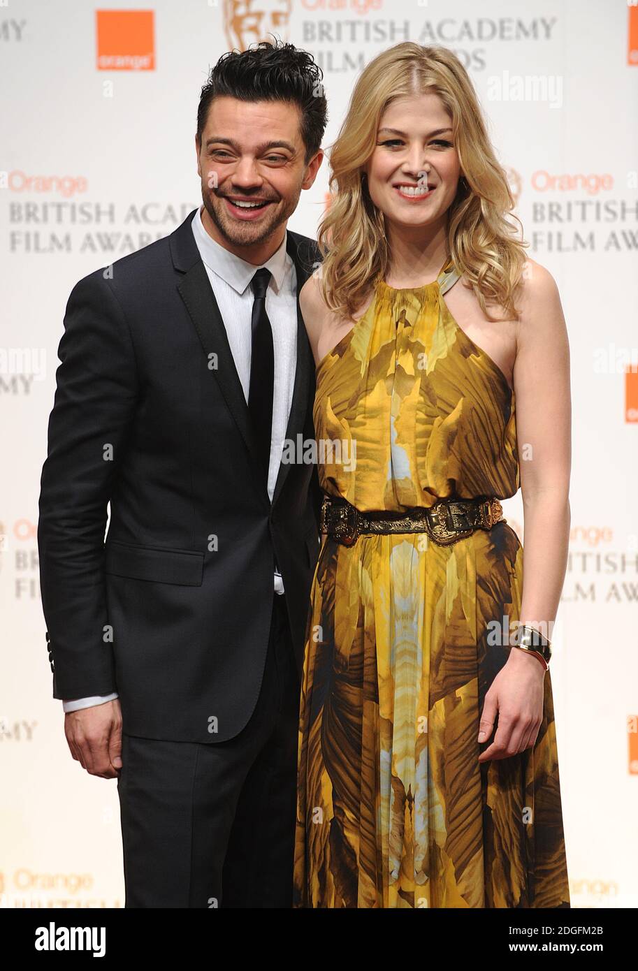 Dominic Cooper and Rosamund Pike in the press room at the 2011 Orange ...