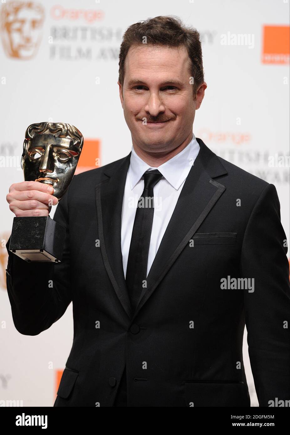 Darren Aronofsky with the Best Actress award presented in the absence ...