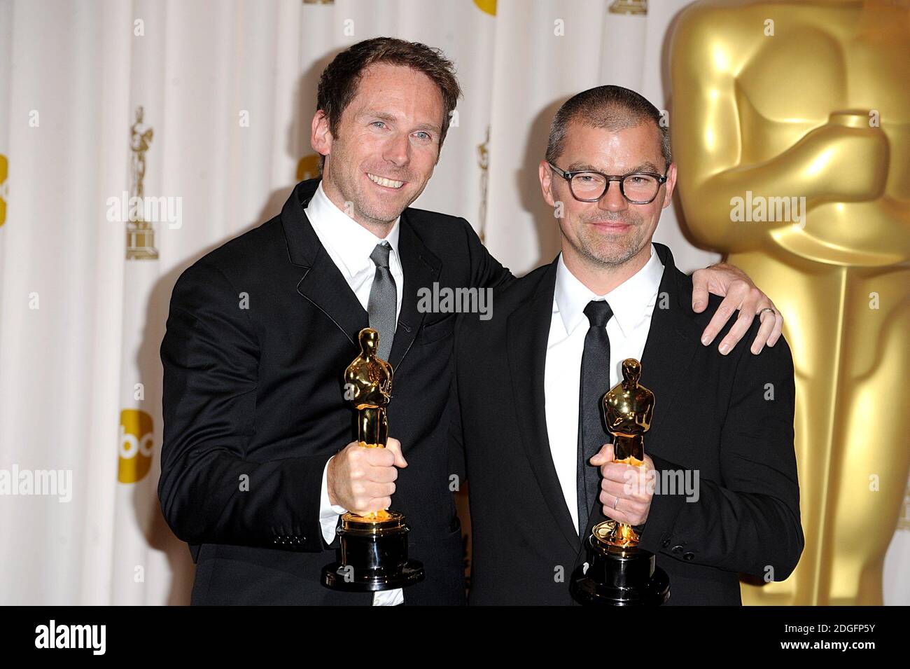 Angus Wall and Kirk Baxter with the Best Film Editing award, received ...