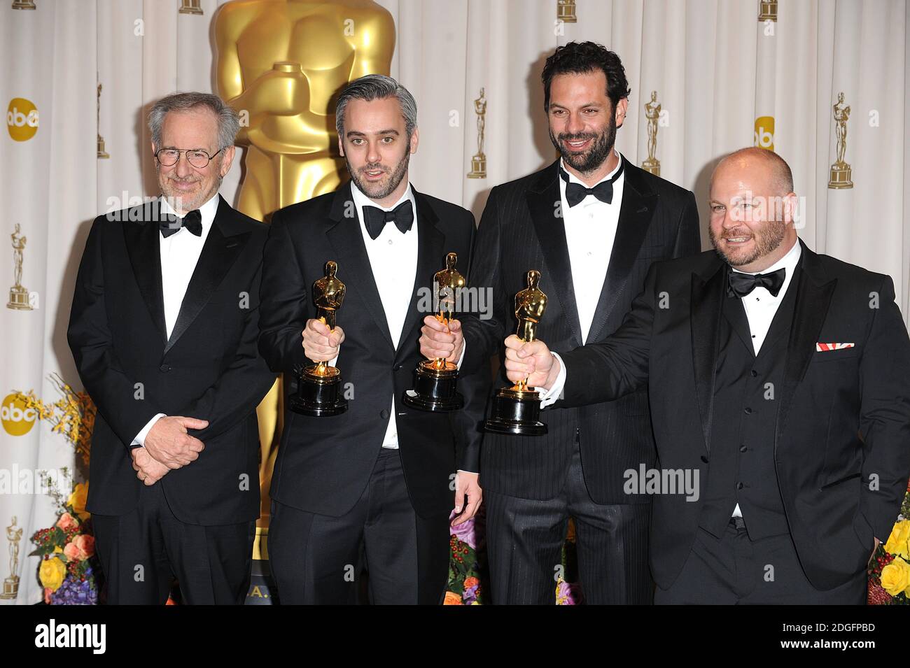 (L-R) Steven Spielberg with winners Emile Sherman, Iain Canning and ...