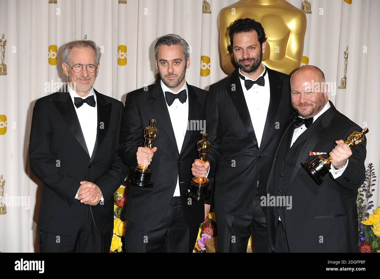 (L-R) Steven Spielberg with winners Emile Sherman, Iain Canning and ...