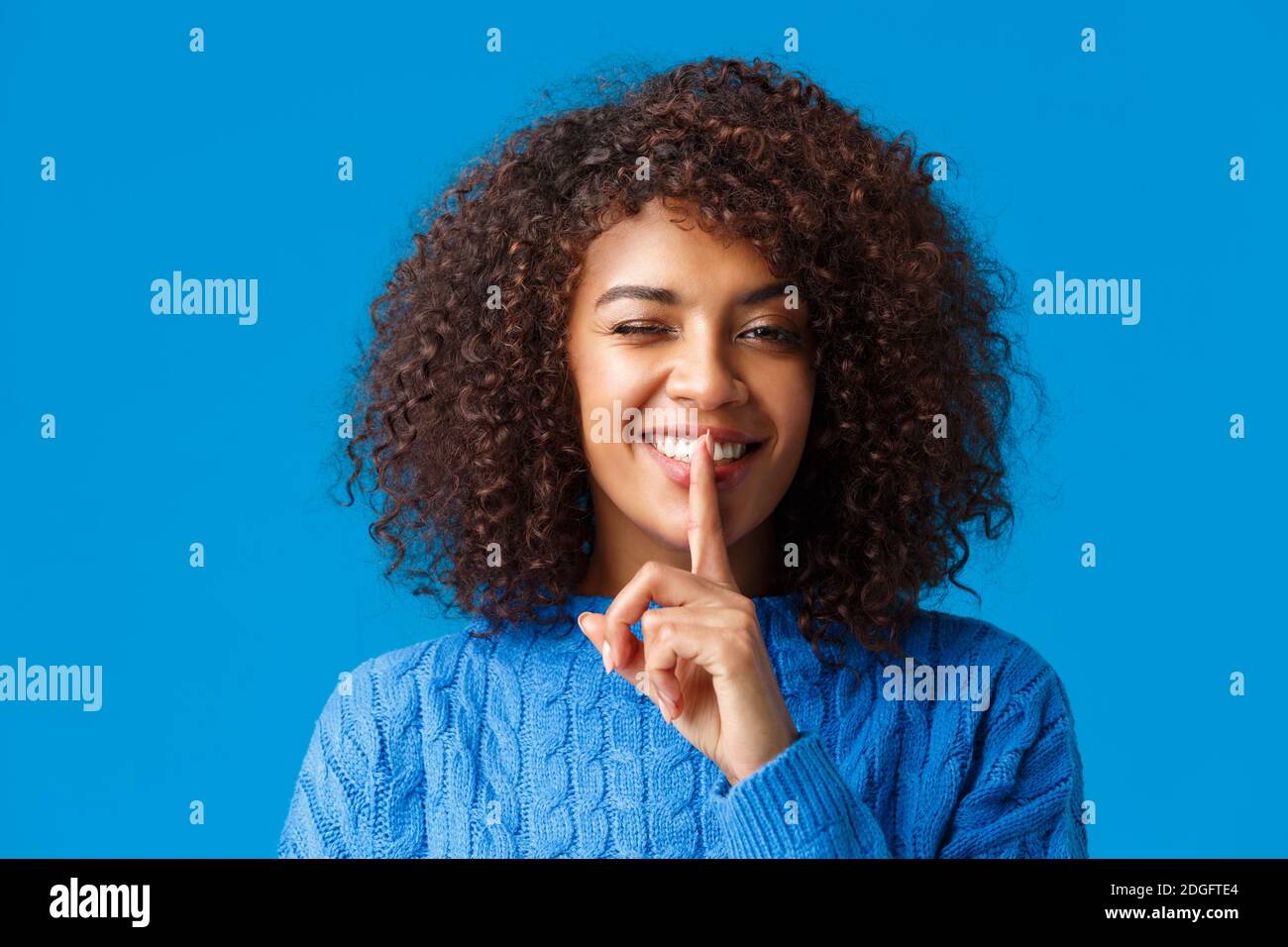 Carefree happy african-american hipster girl, with stylish afro haircut ...