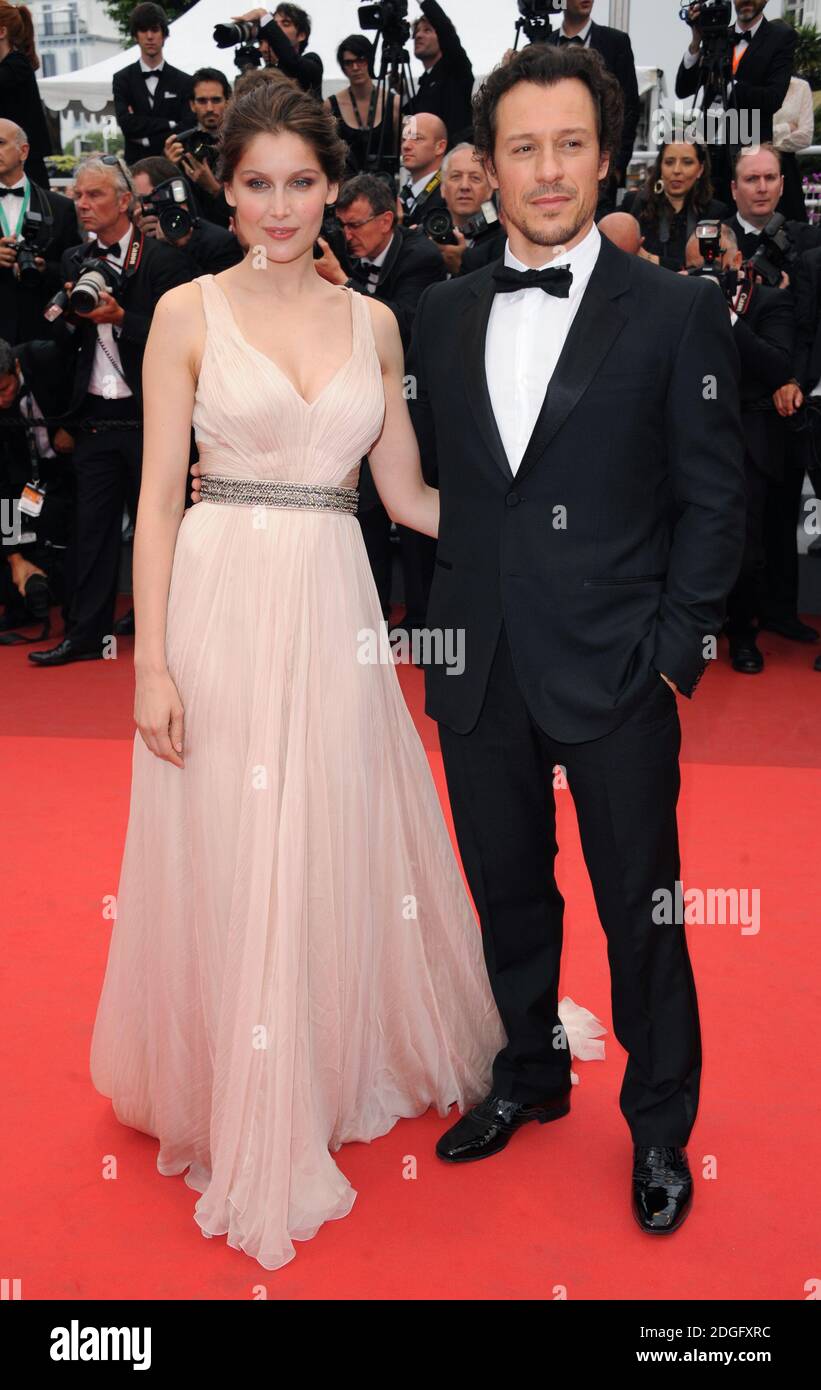 Laetitia Casta and husband arriving at the Premiere of La Conquete, the ...
