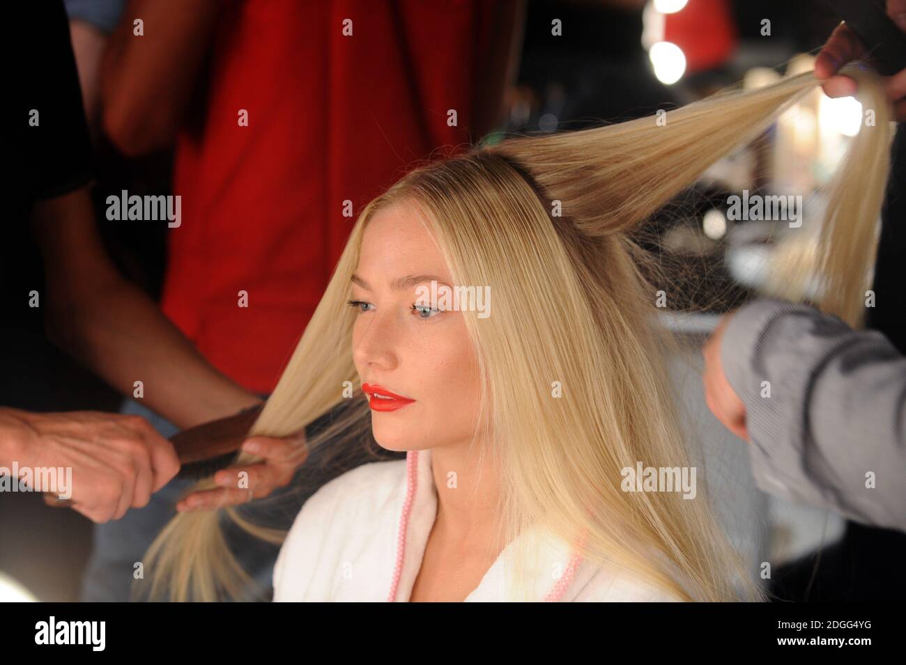 Models have their hair done backstage at the PPQ Spring Summer 2012 ...