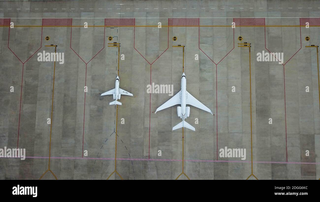 Aerial view to international airport with airplane. Due to Corona ...