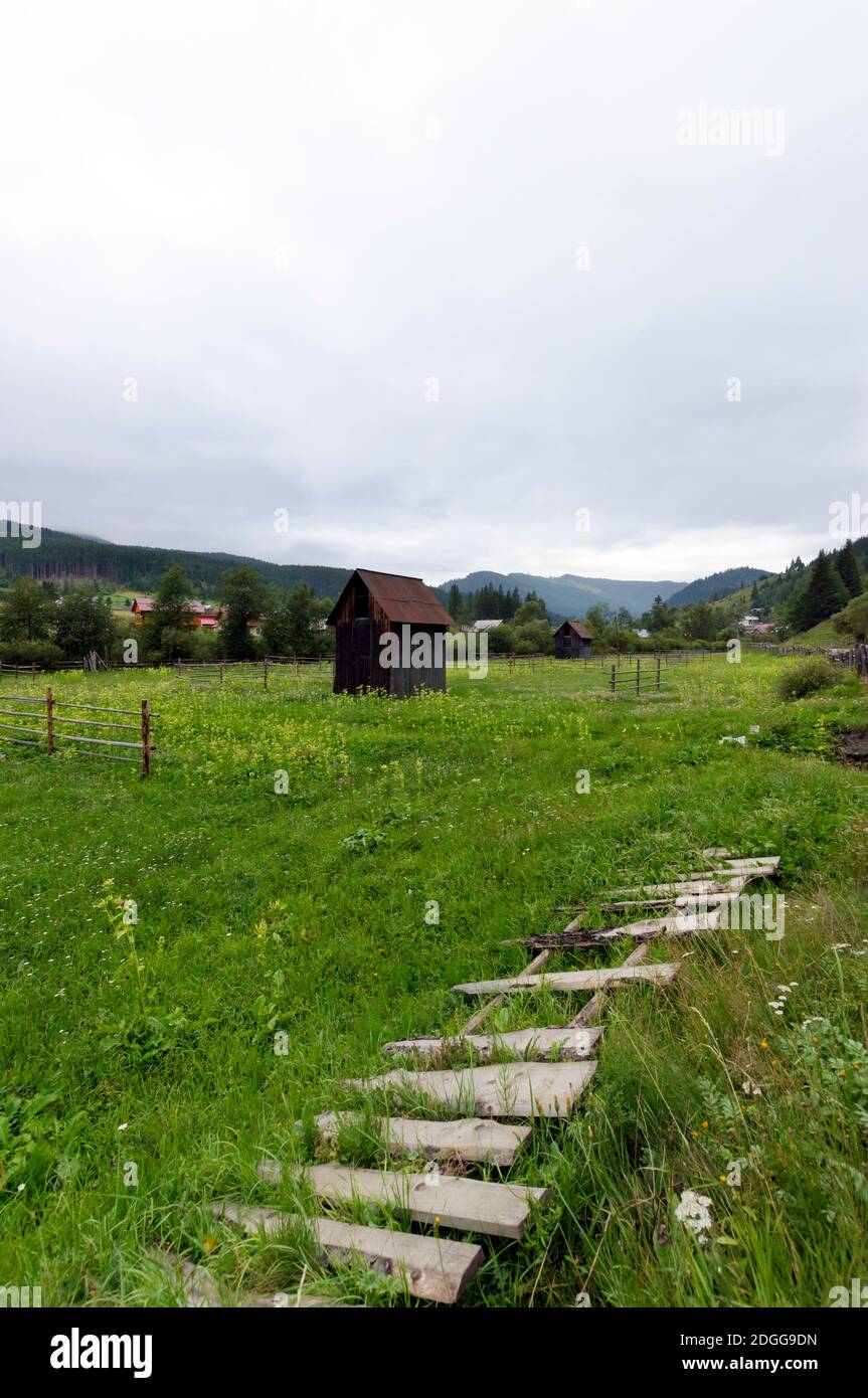 Wooden barn in Romania's countryside Stock Photo - Alamy