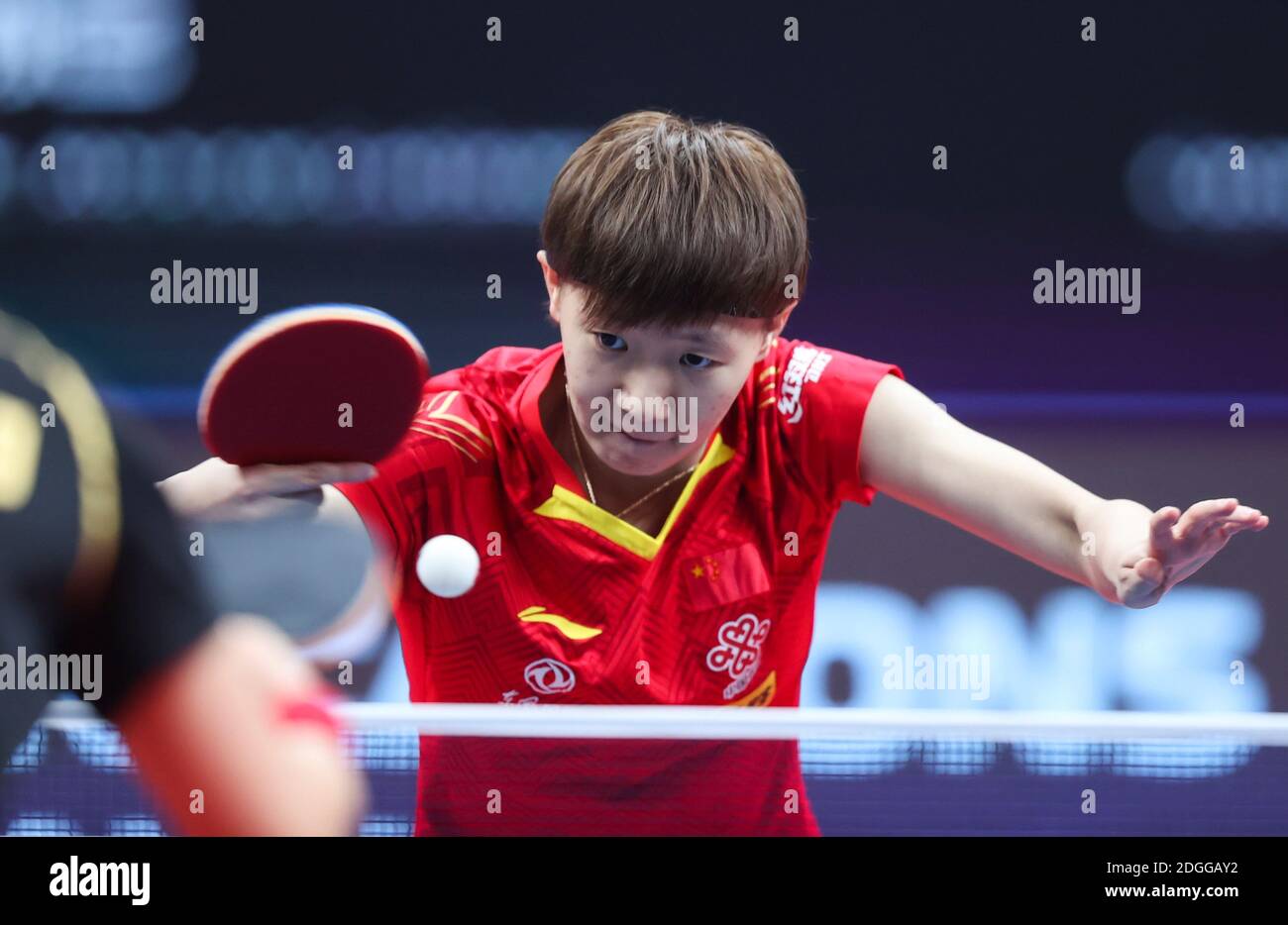 Chinese table tennis player Wang Manyu plays against Chinese table ...