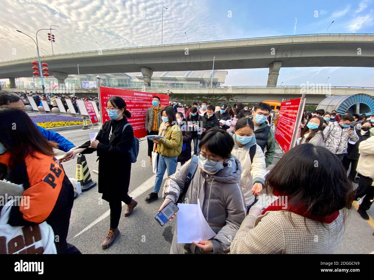 People line up to sit in the National Civil Service Examination in ...