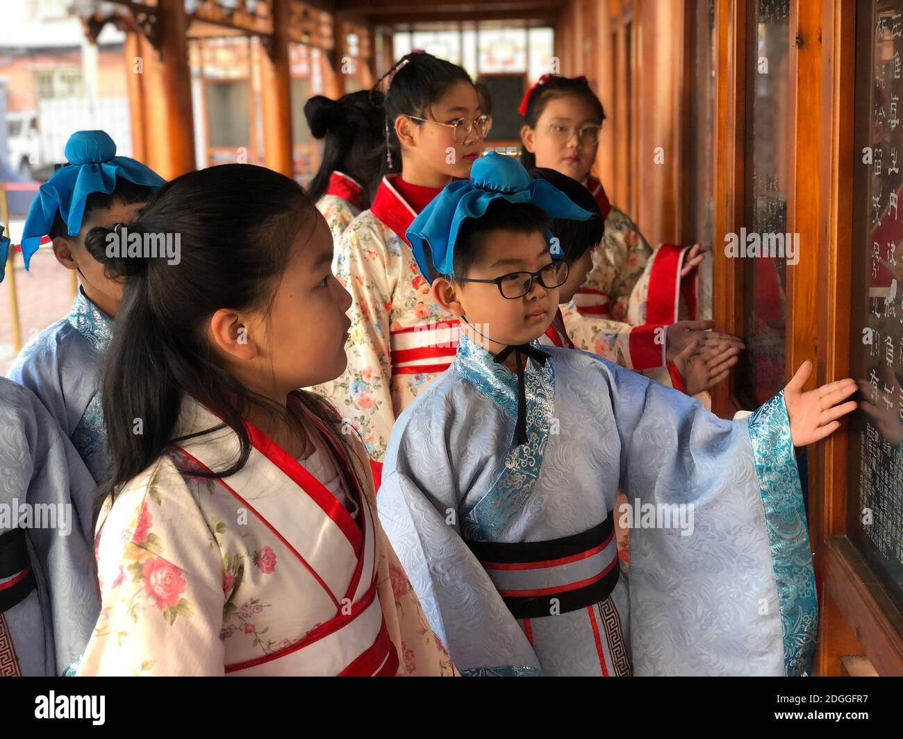 Primary school students dressed in Hanfu, a traditional Chinese folk ...