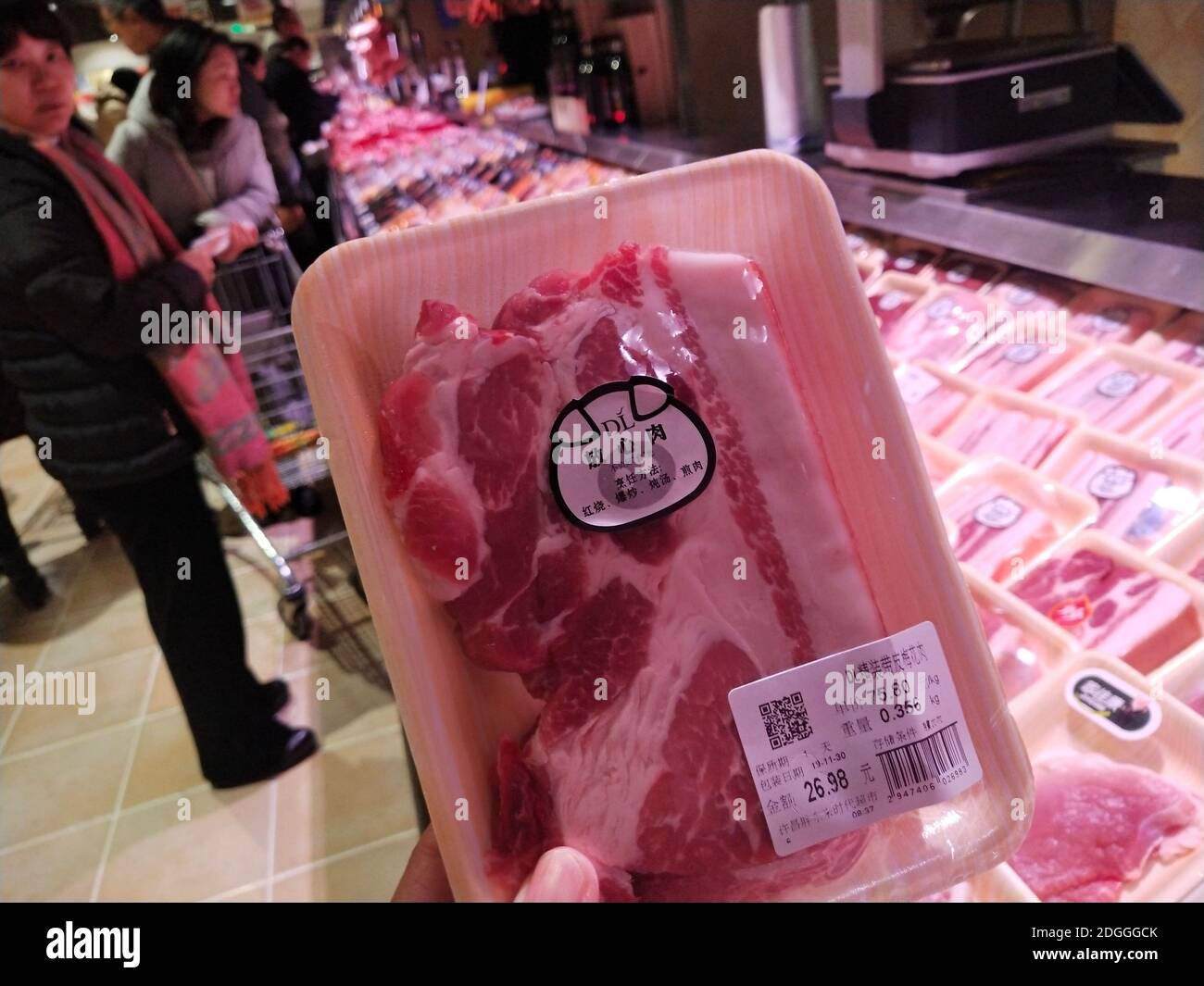 --FILE--In this undated and unlocated photo, customers line up to buy ...