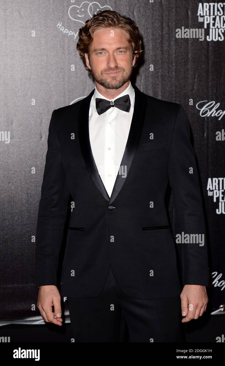 Gerard Butler arriving at the Haiti Carnival in Cannes Gala, part of ...