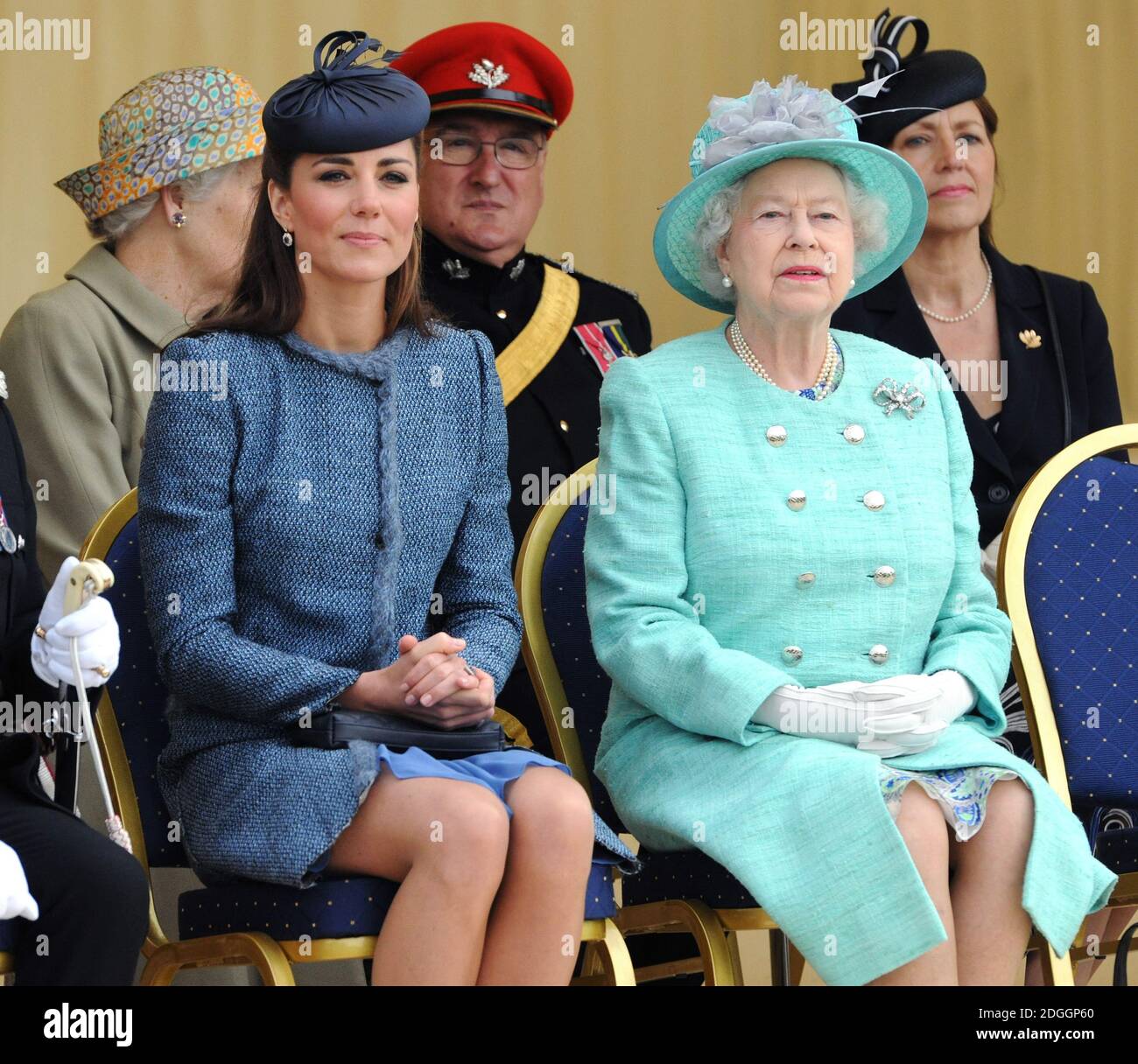 The Duchess of Cambridge and Queen Elizabeth II watch a children's ...