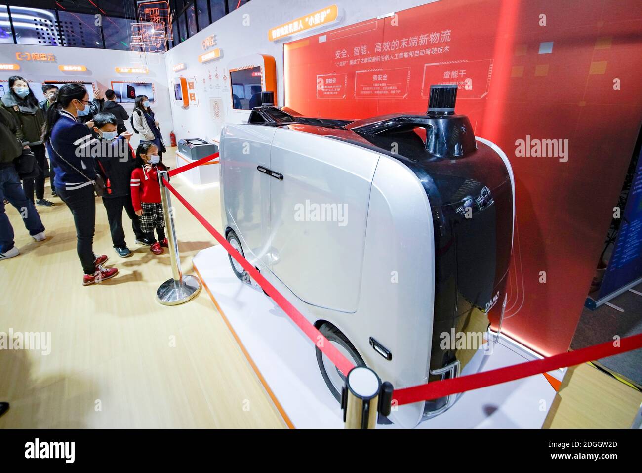Visitors experience and take photos of the products exhibited at the ...