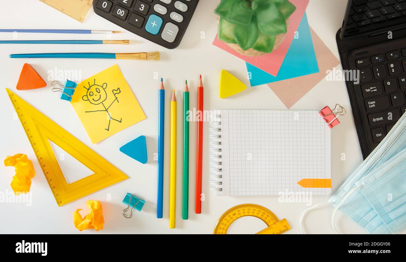 School concept. Open notebook with school supplies Stock Photo - Alamy