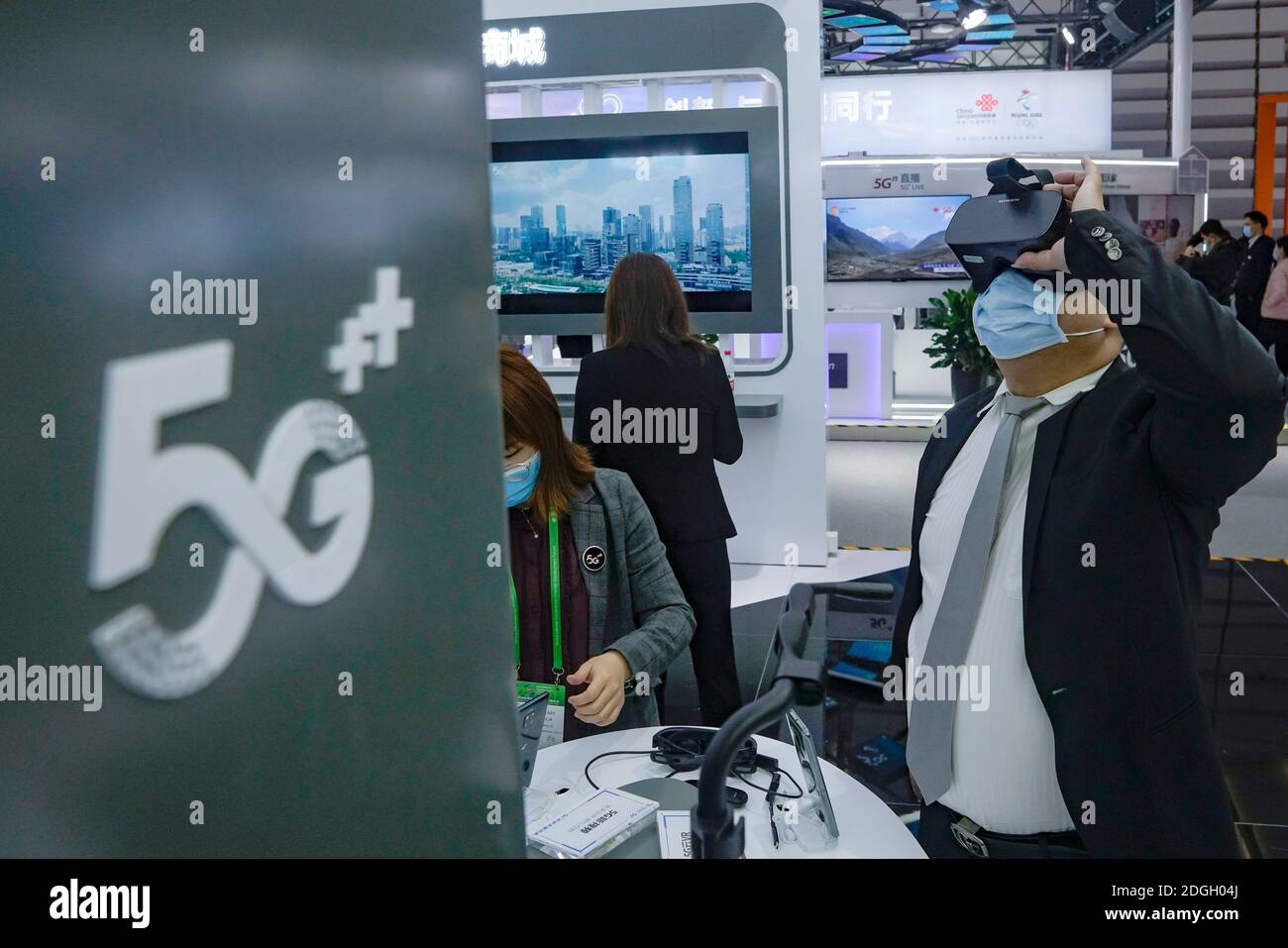 Visitors experience and take photos of the products exhibited at the ...