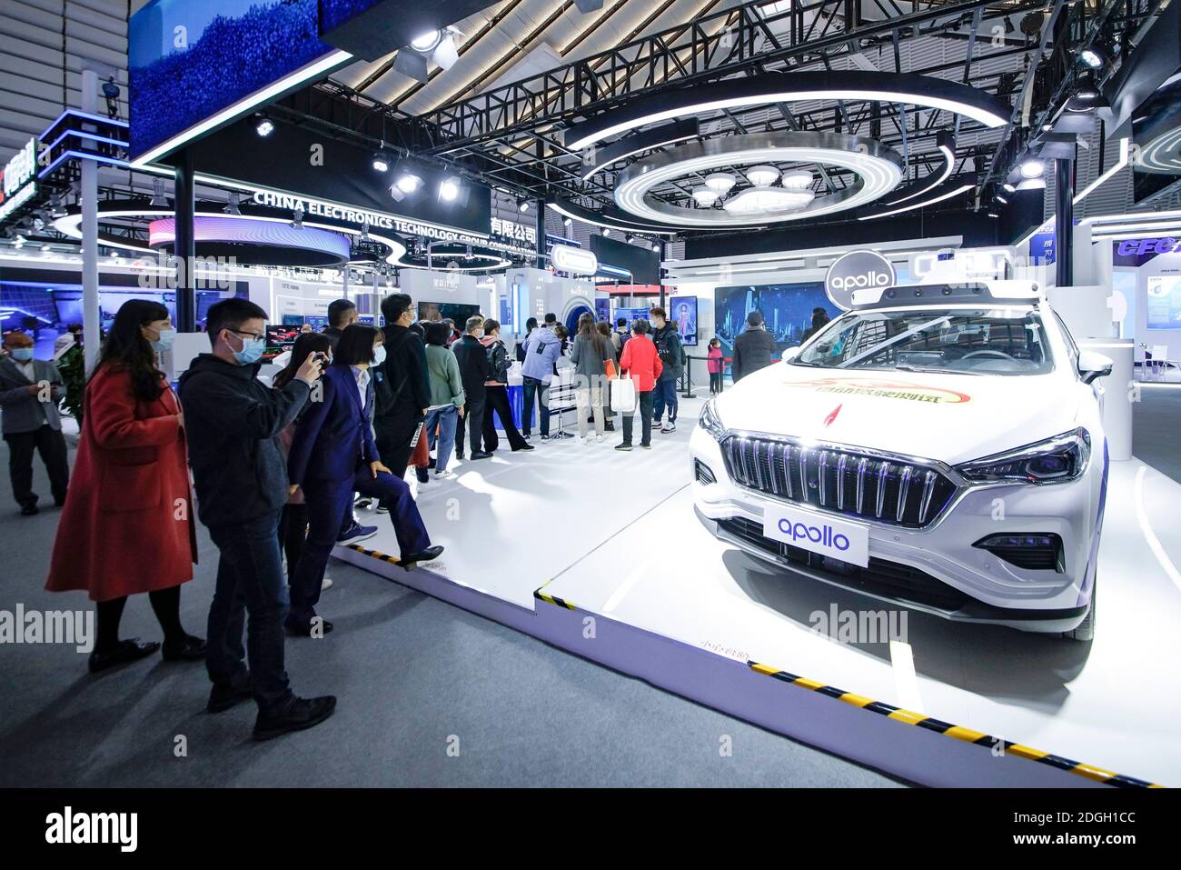 Visitors experience and take photos of the products exhibited at the ...