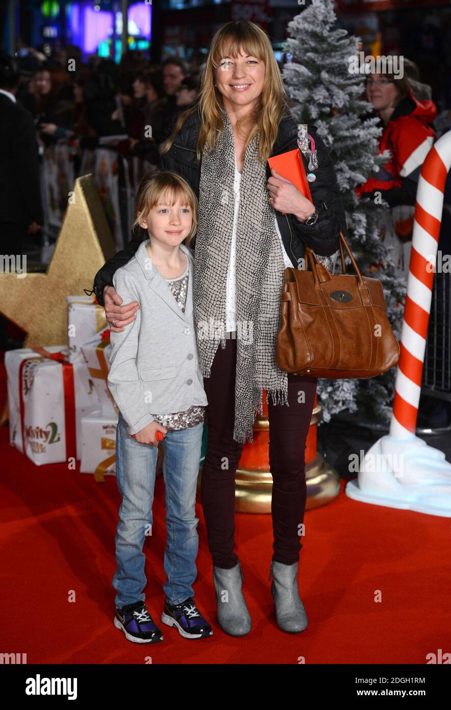 Sara Cox and daughter arriving at the premiere of Nativity 2, Empire ...
