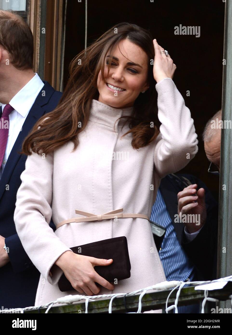 The wind catches the hair of the Duchess of Cambridge on her visit to ...