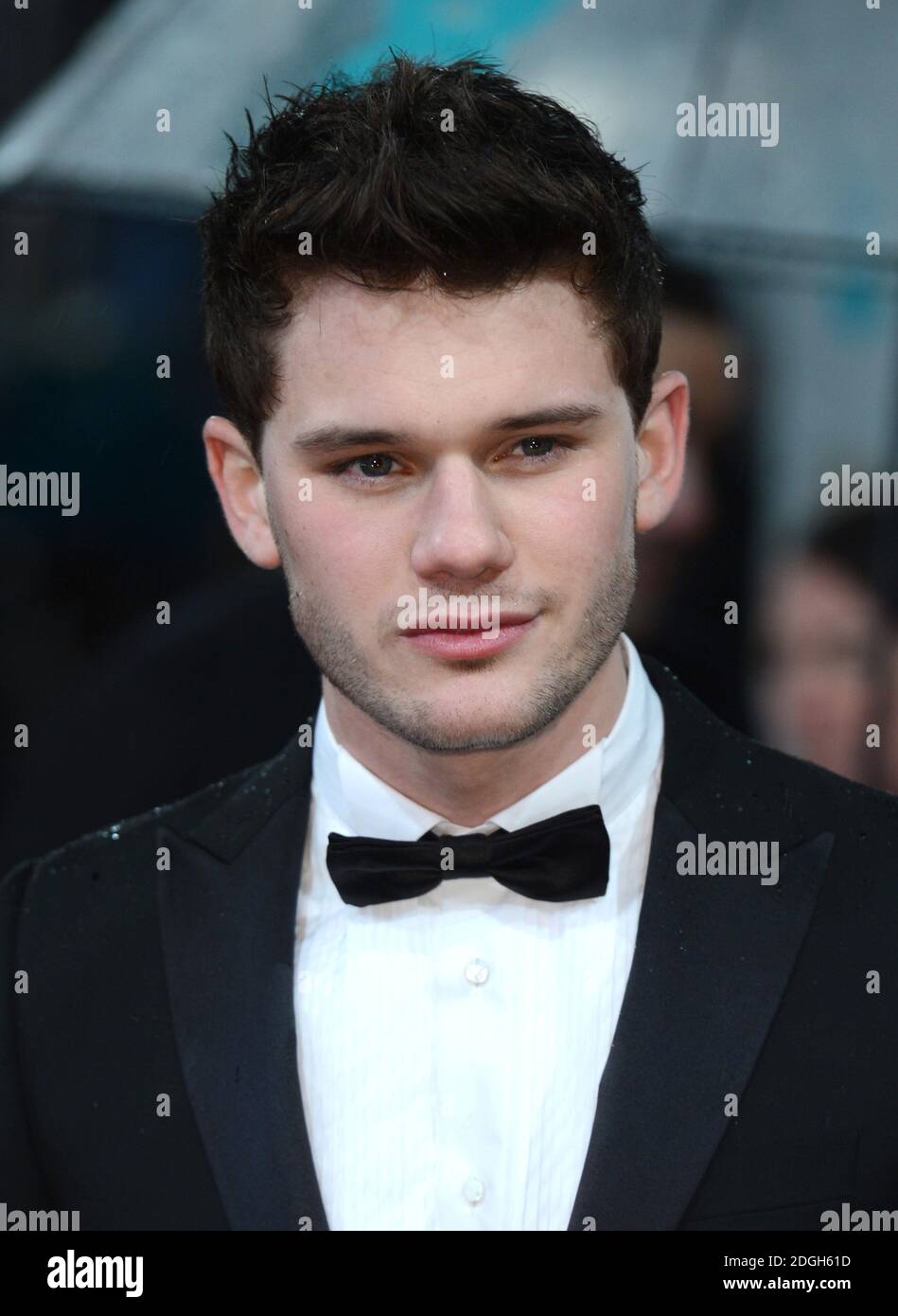 Jeremy Irvine arriving at The EE British Academy Film Awards 2013, The ...