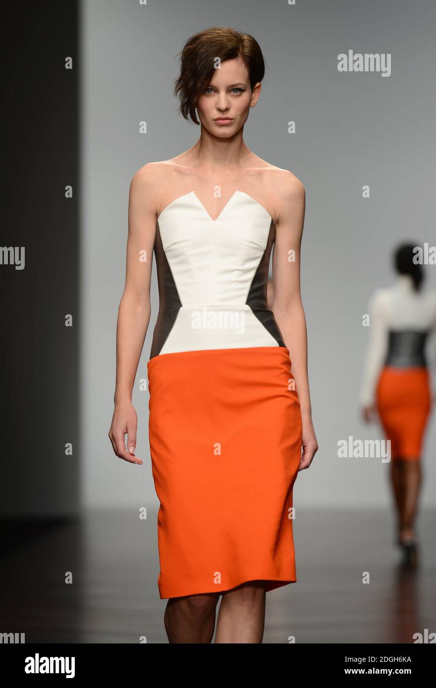 A model wears a design by Zoe Jordan during the autumn/ winter 2013 ...