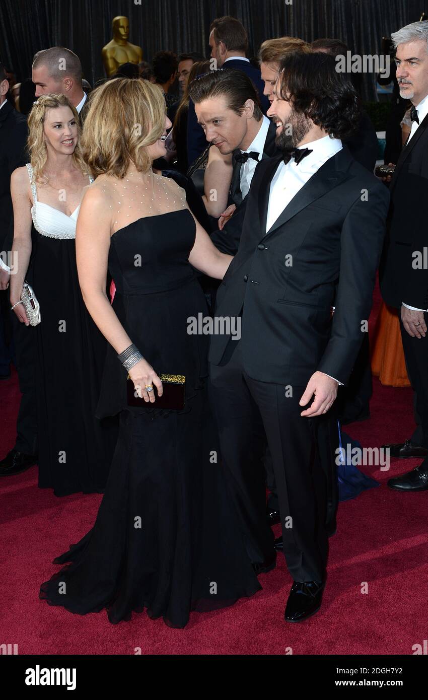 Paul Rudd (right), Jeremy Renner and Julie Yaeger arriving for the 85th ...