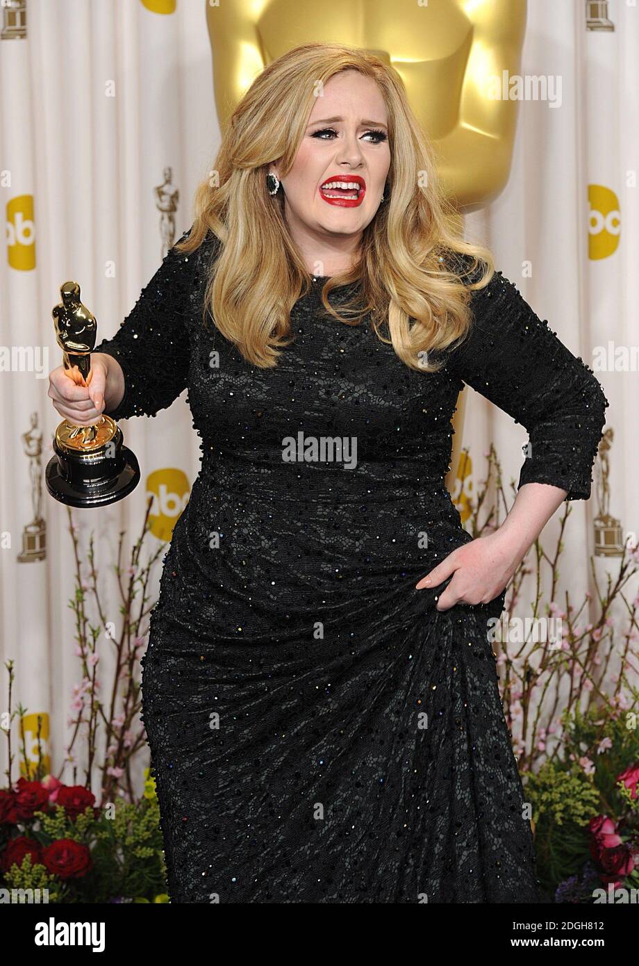 Adele with the Oscar for Achievement in Music (Original Song) for ...