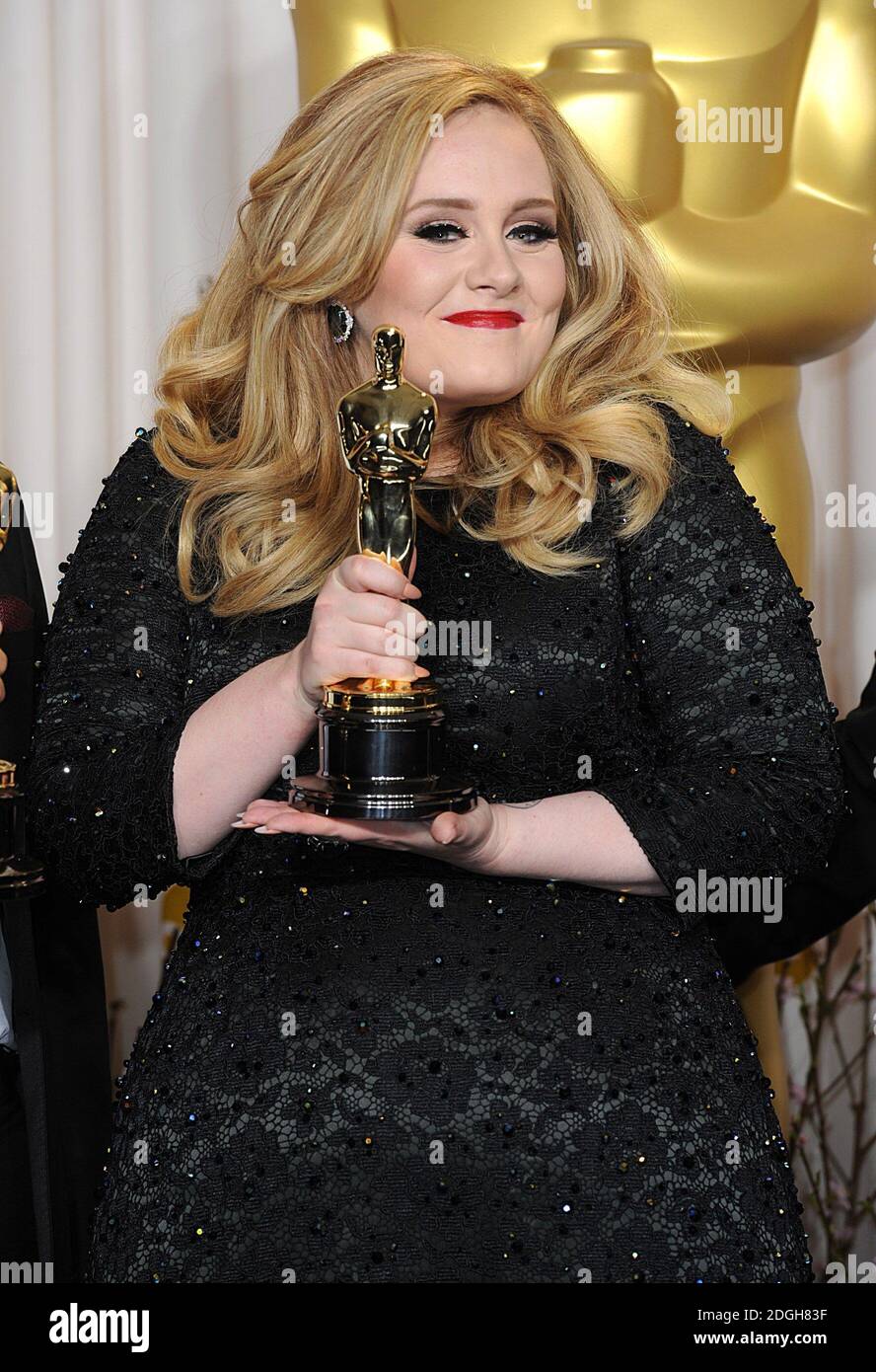 Adele with the Oscar for Achievement in Music (Original Song) for ...