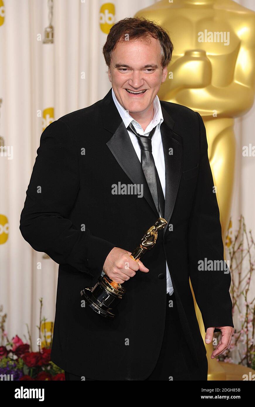 Quentin Tarantino with the Oscar for Original Screenplay for Django Unchained at the 85th ...