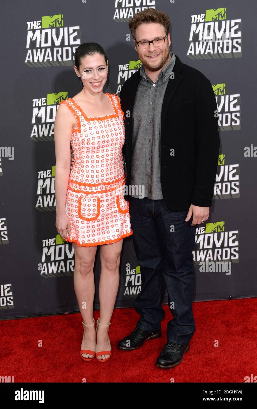 Seth Rogan and wife Lauren Miller arriving at The MTV Movie Awards 2013 ...