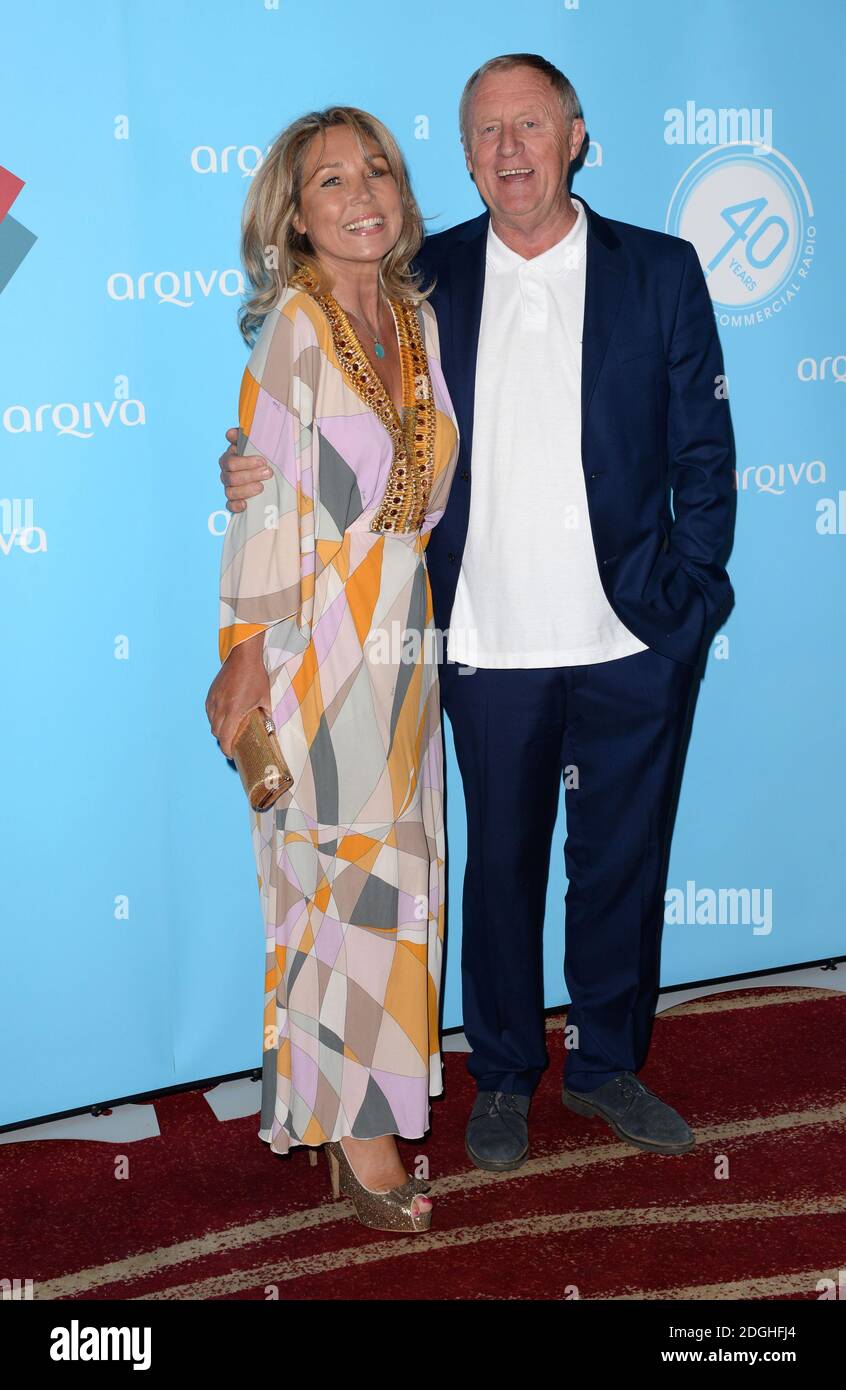 Chris Tarrant and partner arriving at The Arqiva Commercial Radio ...