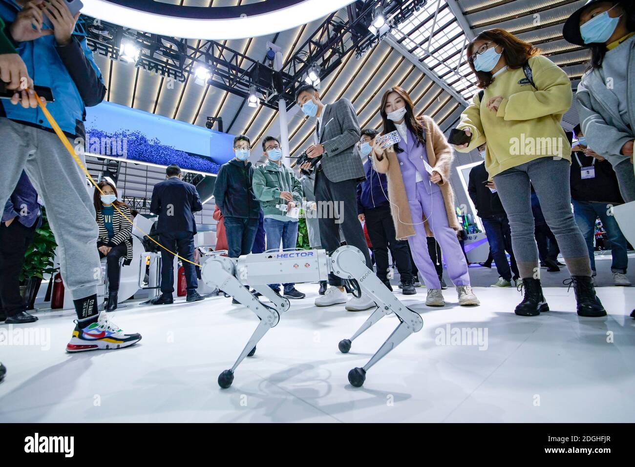 Visitors experience and take photos of the products exhibited at the ...