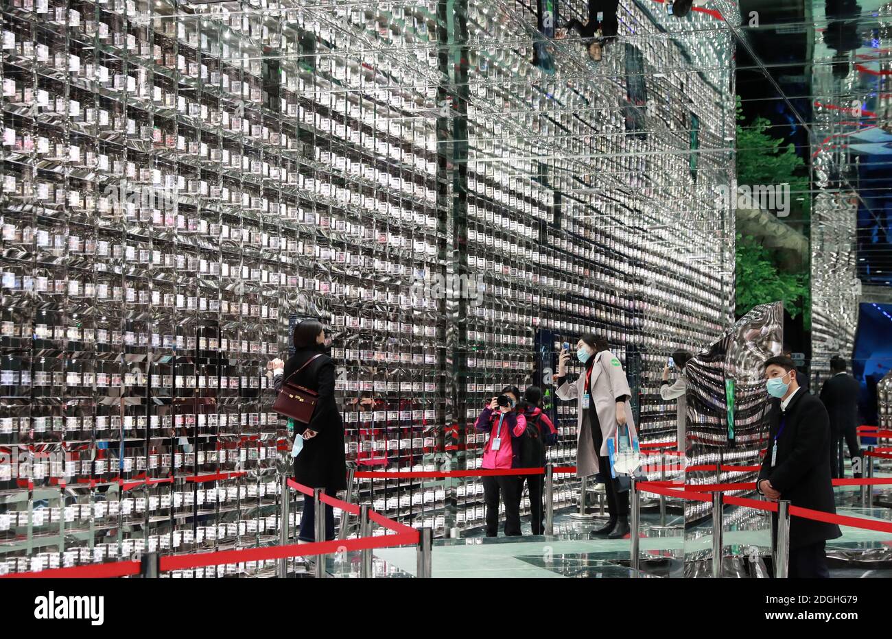 People observe the seeds preserved and presented at the "Seed Bank ...