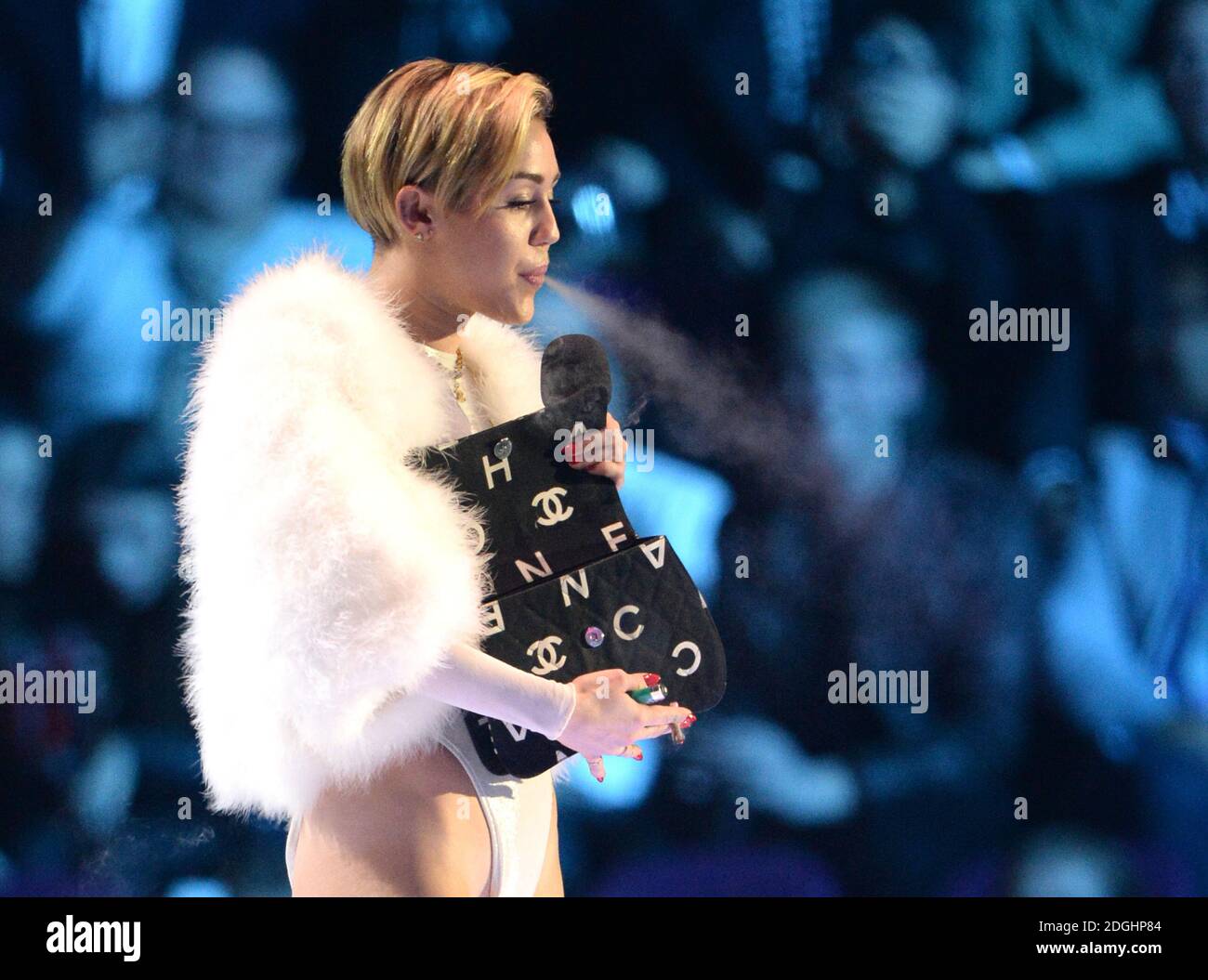Miley Cyrus smokes on stage during the 2013 MTV Europe Music Awards at ...