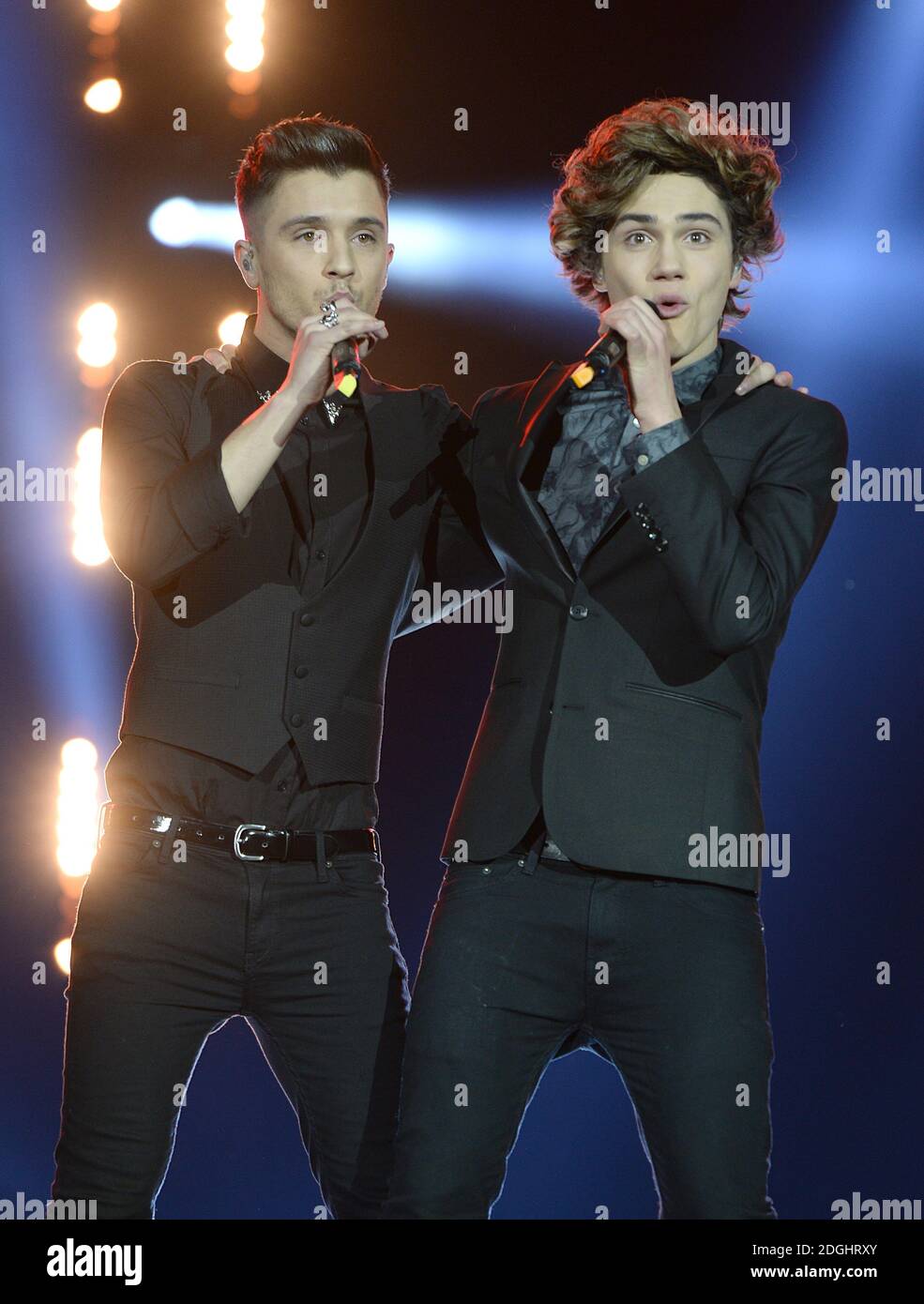 JJ Hamblett and George Shelley of Union J performing on stage during ...
