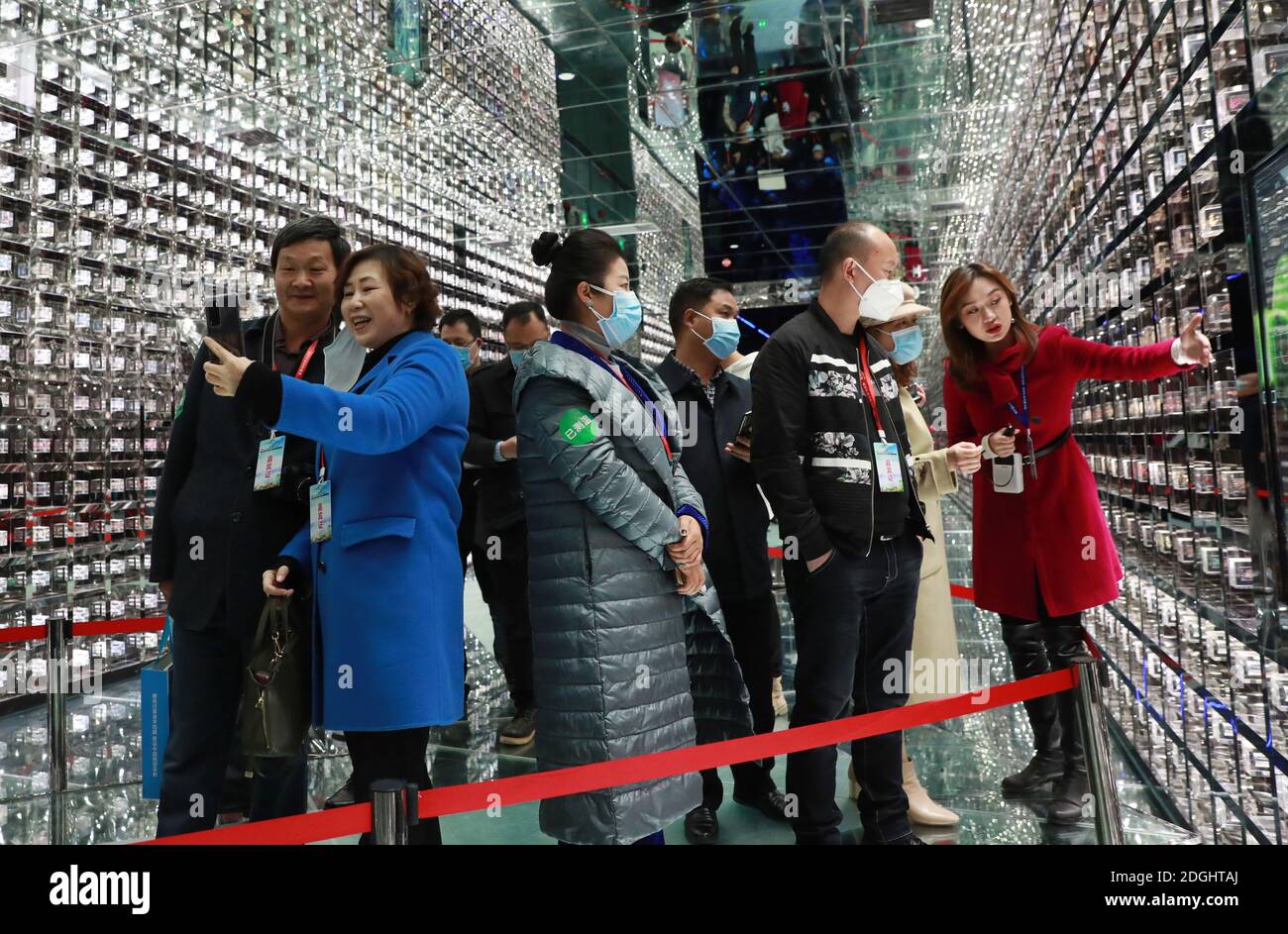 People observe the seeds preserved and presented at the "Seed Bank ...