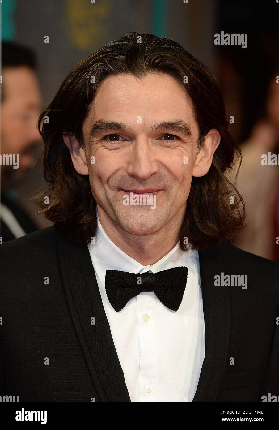 Justin chadwick arriving at the ee british academy film 2014 hi-res ...