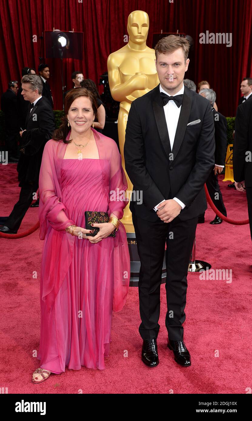 Zachary Heinzerling and Lydia Dean Pilcher arriving at the 86th Academy ...