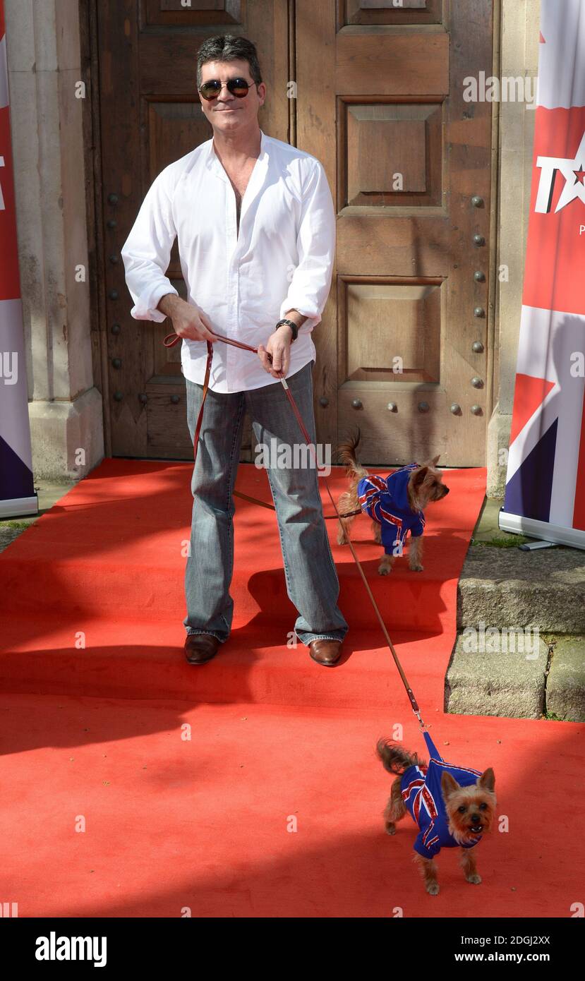 Simon Cowell with his dogs Squiddly and Diddly arriving at the Britains ...