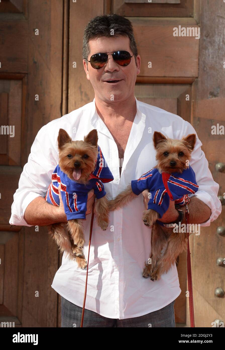 Simon Cowell with his dogs Squiddly and Diddly arriving at the Britains ...