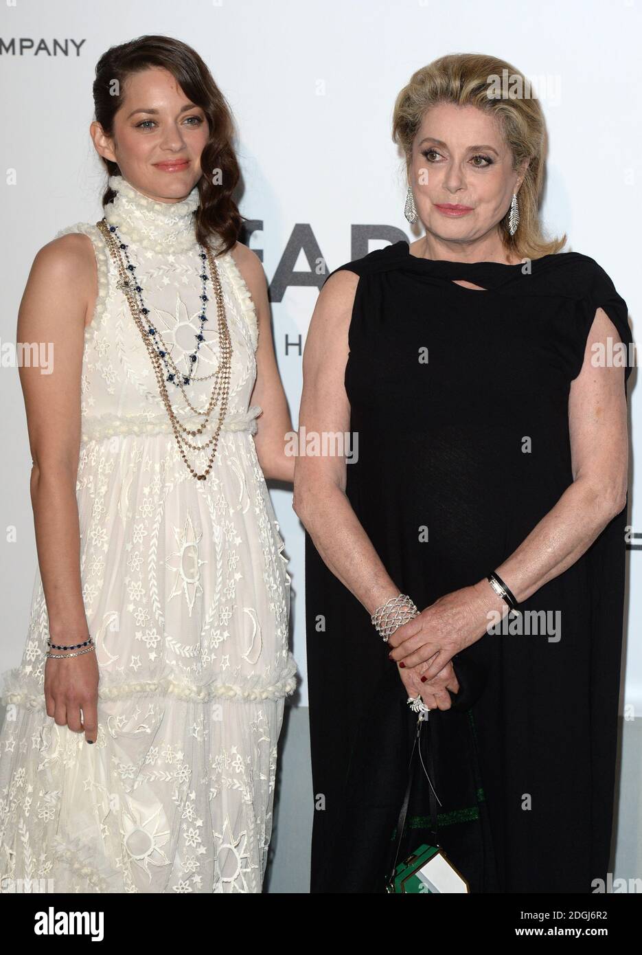 Marion Cotillard and Catherine Deneuve attending the amfAR Gala, Hotel ...