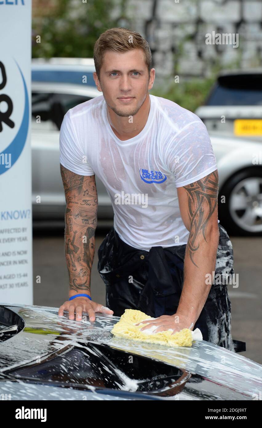 Dan Osbourne during a car wash as he is revealed as newest Dreamboy for ...