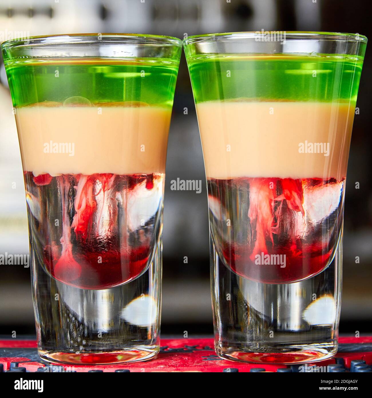 Multicolored alcoholic drinks shots on the bar counter Stock Photo - Alamy