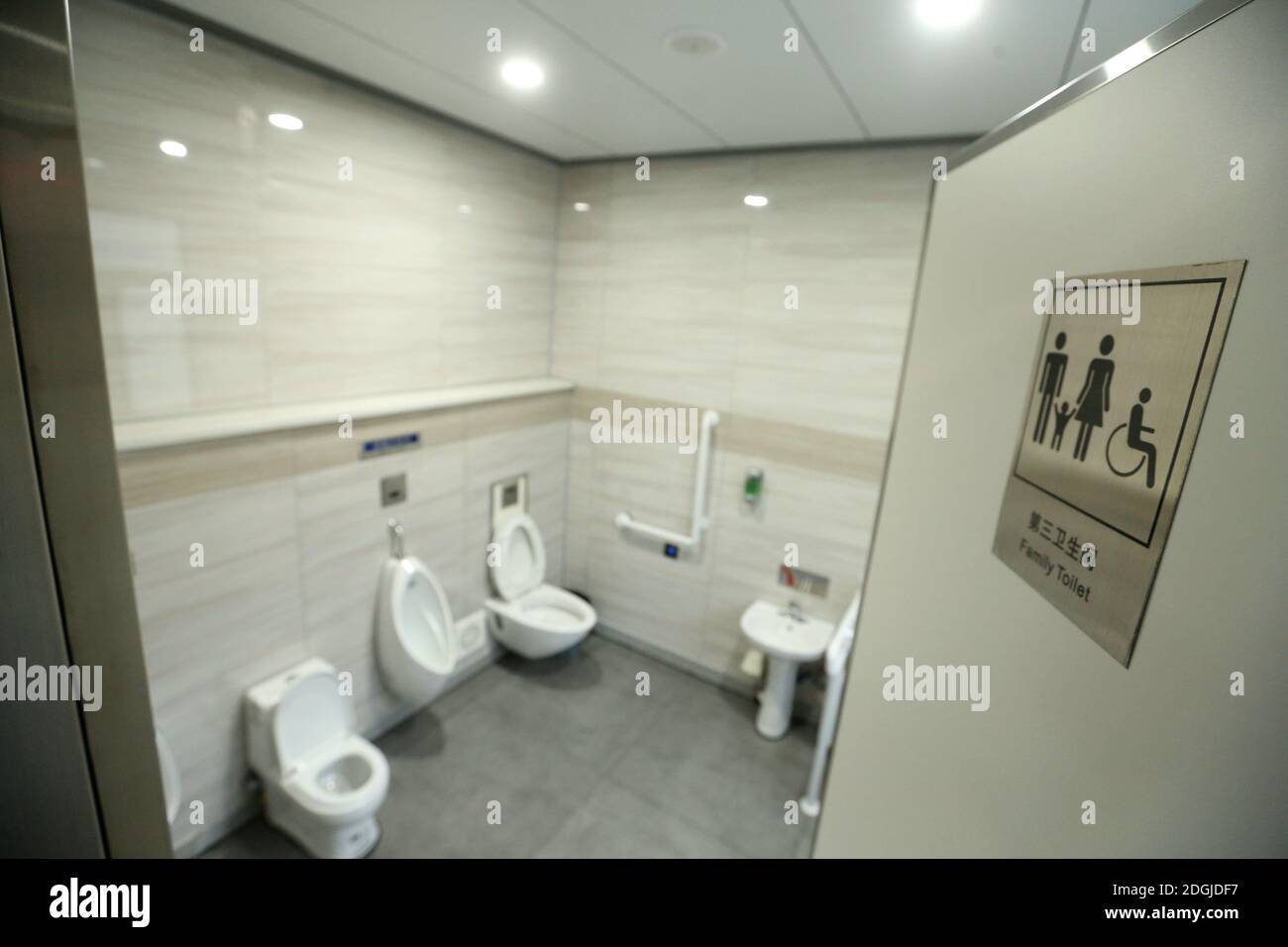 An automatic warning device is installed in a public toilet, if the ...